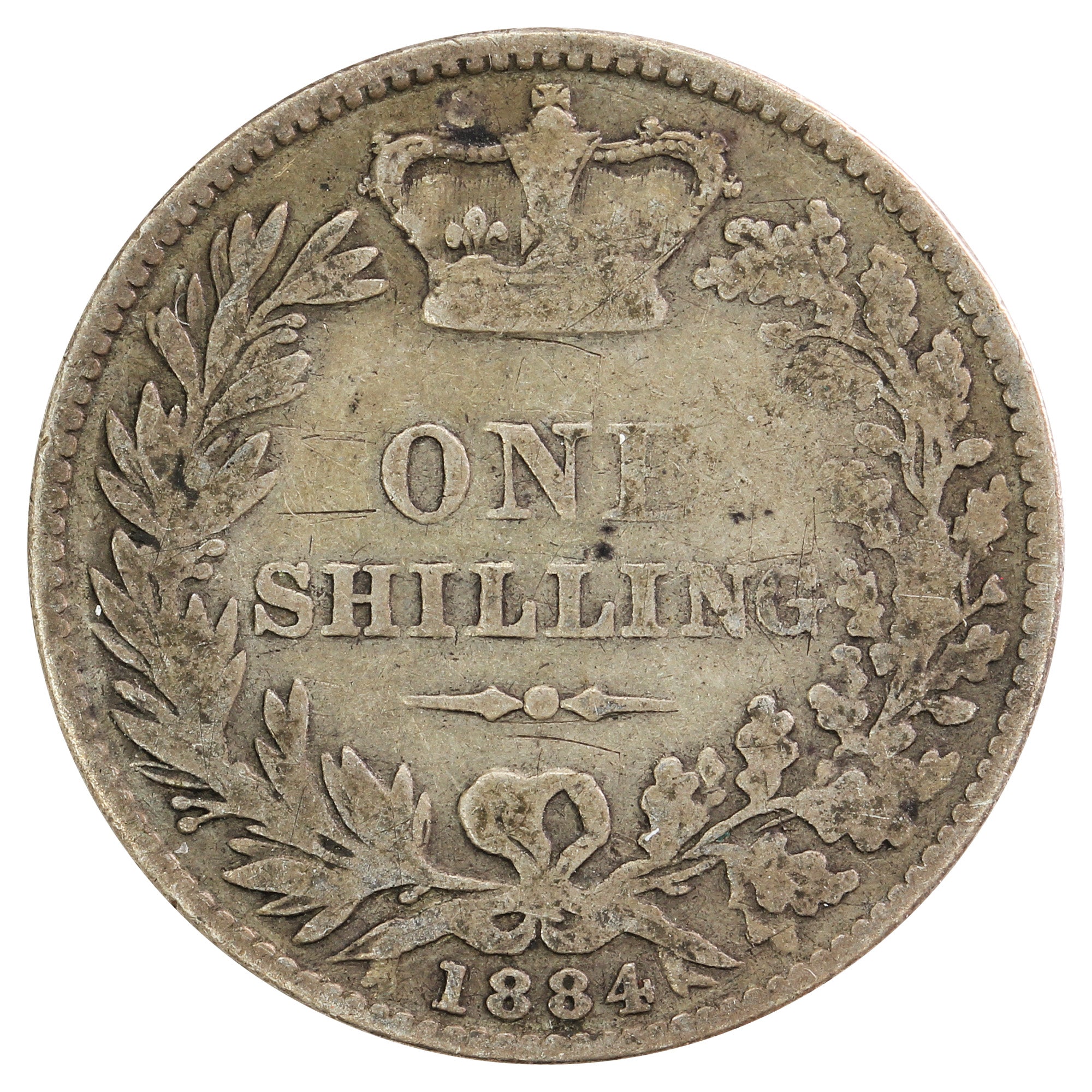 Great Britain 1884 Shilling VG-F (VG10) – Colonial Acres Coins